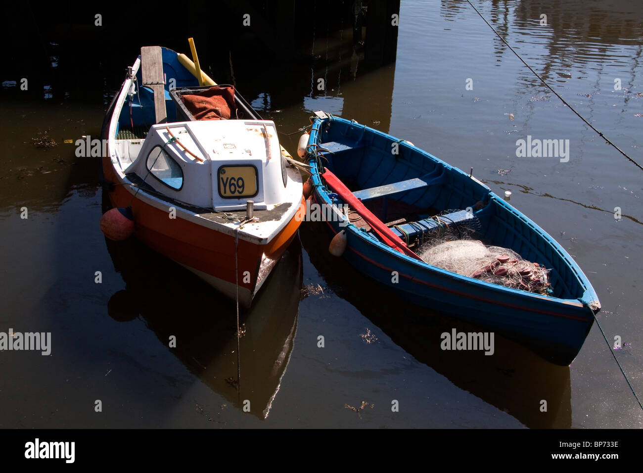 Docked rowboats hi-res stock photography and images - Alamy