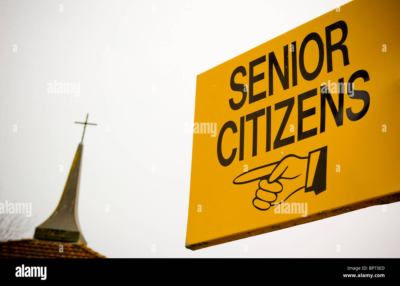 A sign directing senior citizens seems to be encouraging them to go to ...