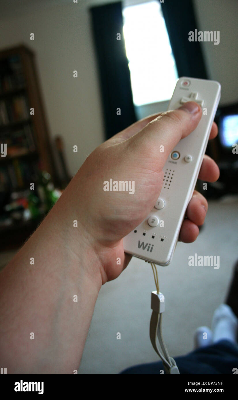 Holding wii game hi-res stock photography and images - Alamy