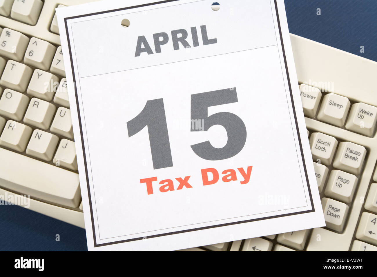 Tax Day, calendar date April 15 and keyboard for background Stock Photo ...