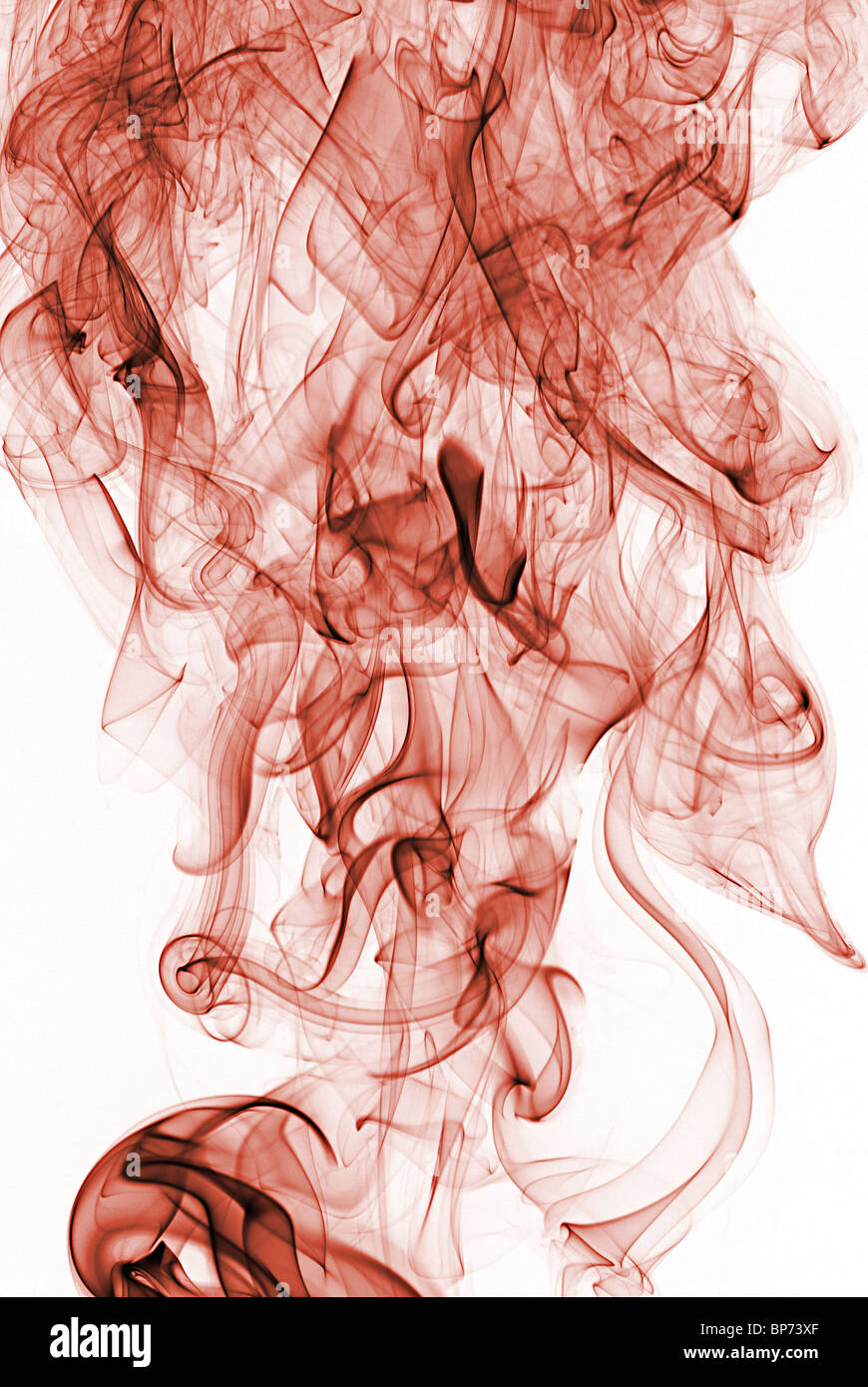 colored smoke trail against white background creating patterns Stock ...