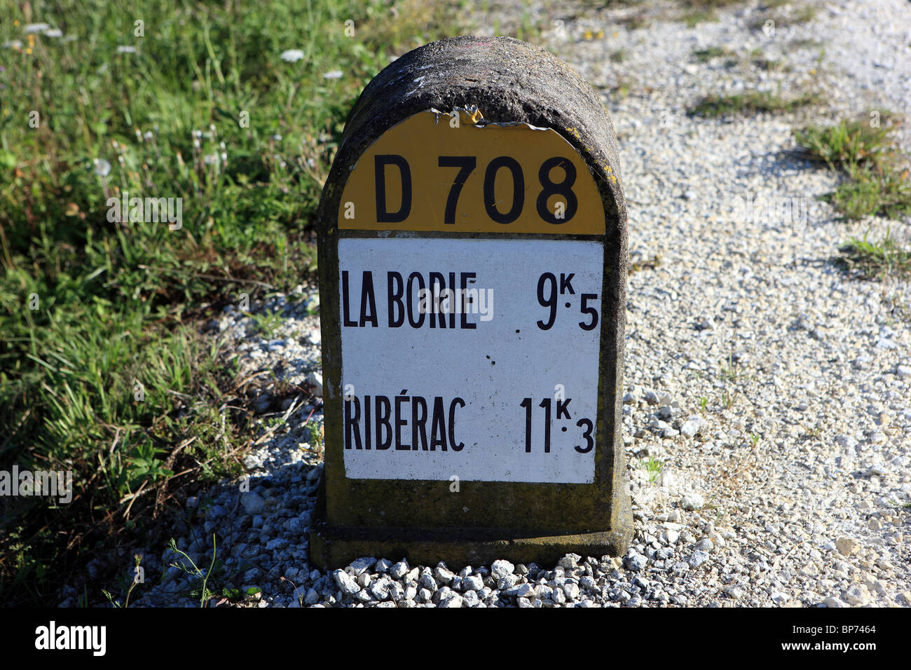 French road marker showing the distance to the French towns of La Borie ...