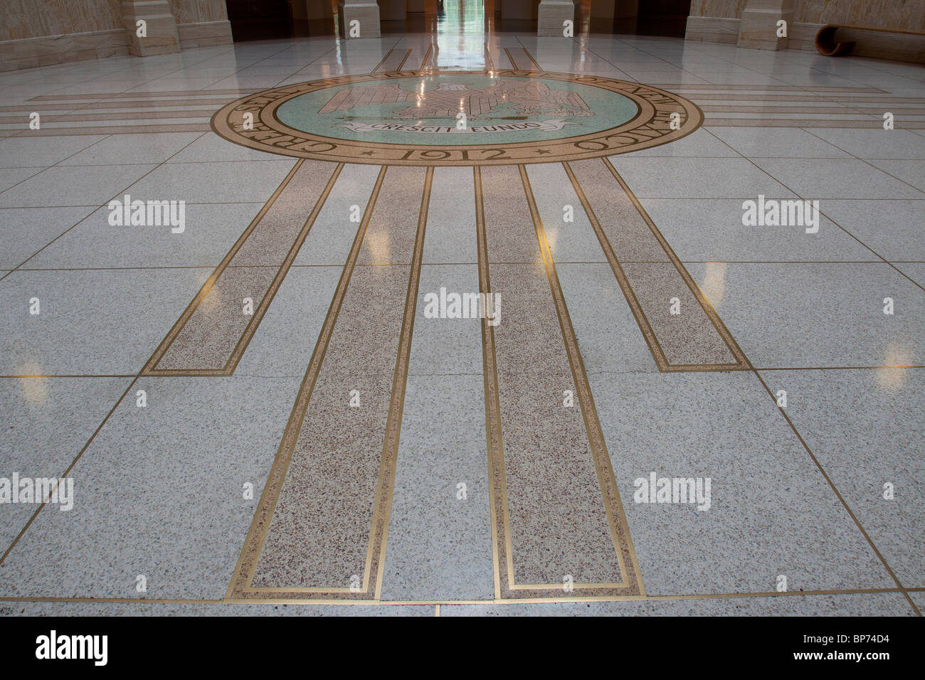 Zia sun symbol on the rotunda floor of the New Mexico state capitol ...