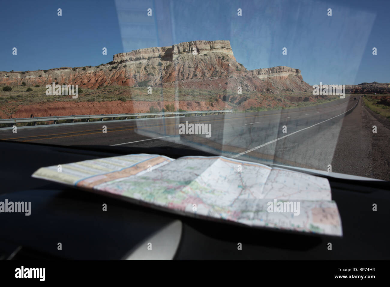 Road map on dashboard of passenger car on Route 550 in New Mexico, USA ...