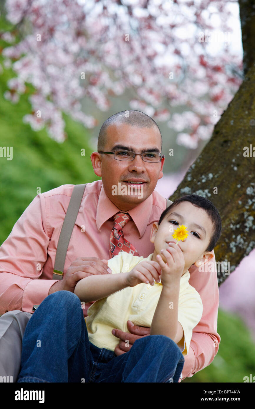 Portland, Oregon, United States Of America; A Father And Son Sitting ...