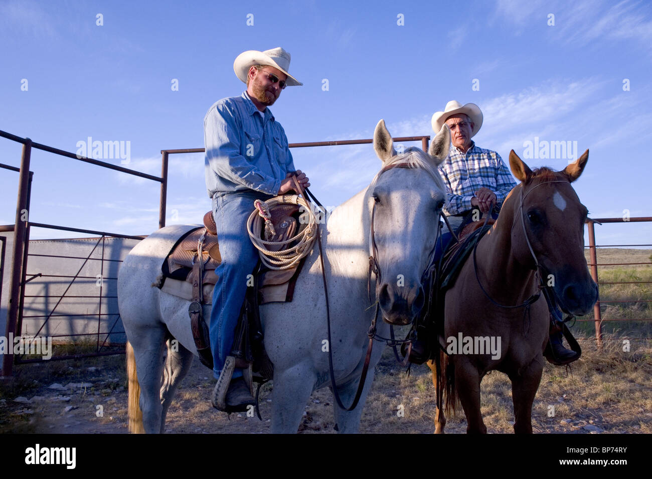 Cowboys on Horseback Posing Stock Photo - Alamy