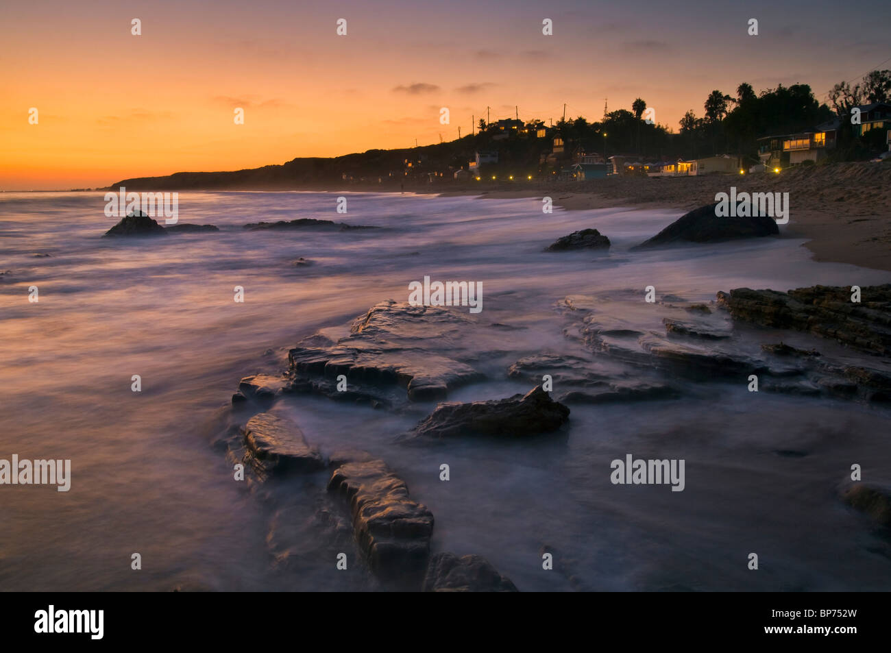 Waves on coastal rocks at sunset, Crystal Cove State Park Historic ...