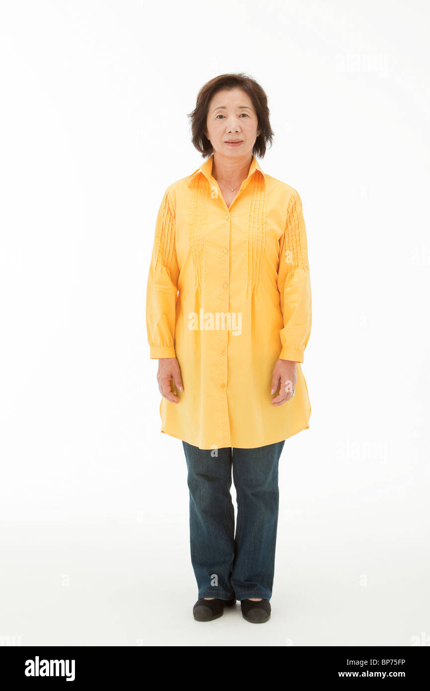 Woman standing senior full hi-res stock photography and images - Alamy