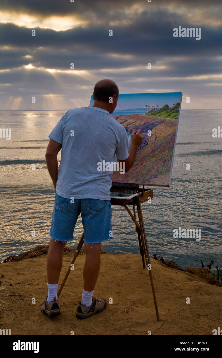 Artist Bill Jewell plein aire painting on coastal bluff overlooking the ...