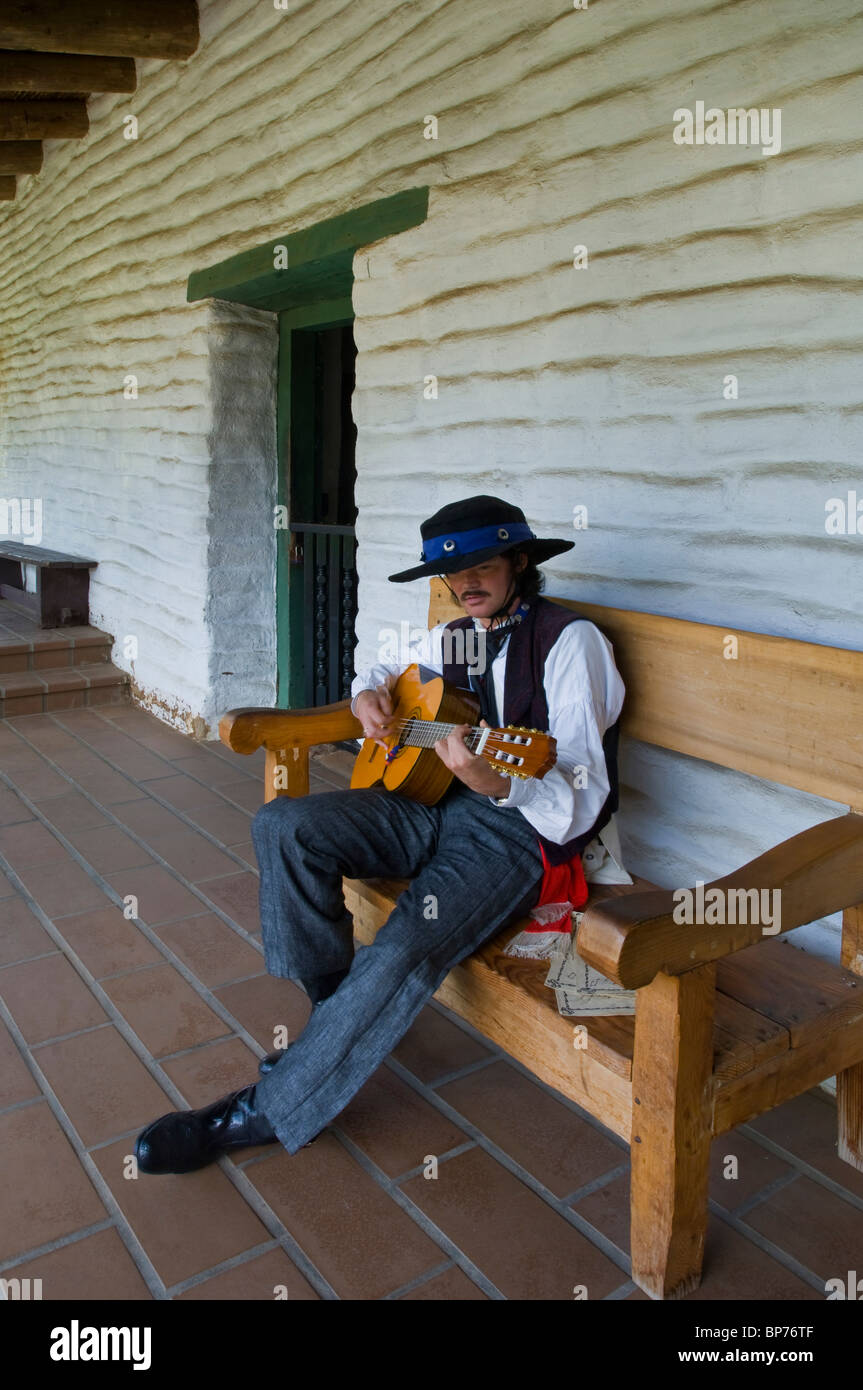Park docent in costume playing guitar, Casa de Estudillo Museum, Old ...