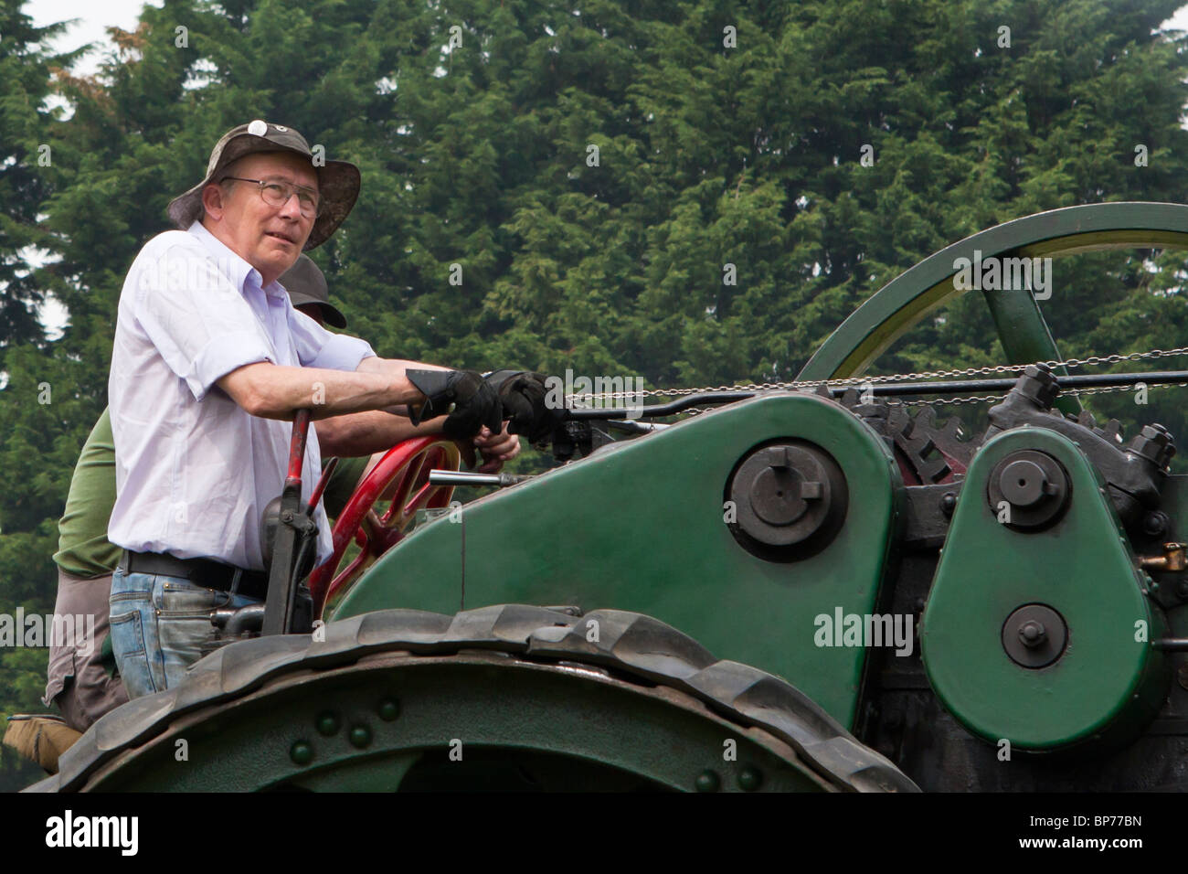 Man driving 1918 Clayton and Shuttleworth traction engine Stock Photo ...