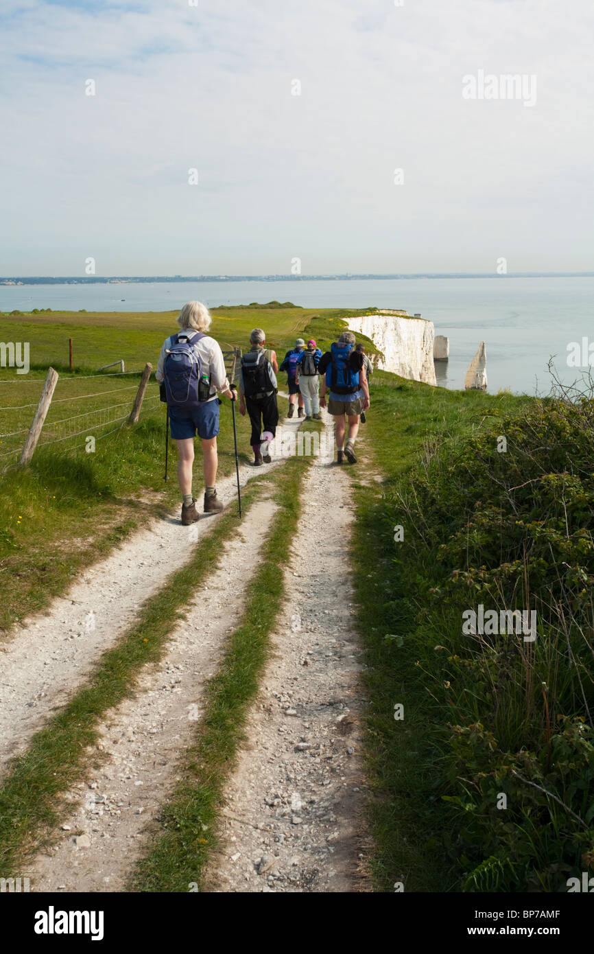 Group of walkers on the coastal path close to Old Harry Rocks near ...