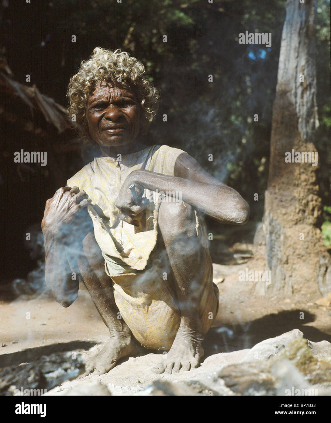 Old aboriginal woman First Nations People by the camp-fire, Alligator ...