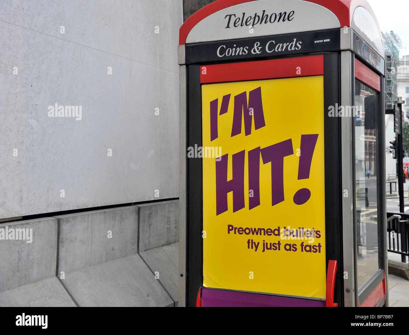 I'm hit telephone box london uk Stock Photo - Alamy