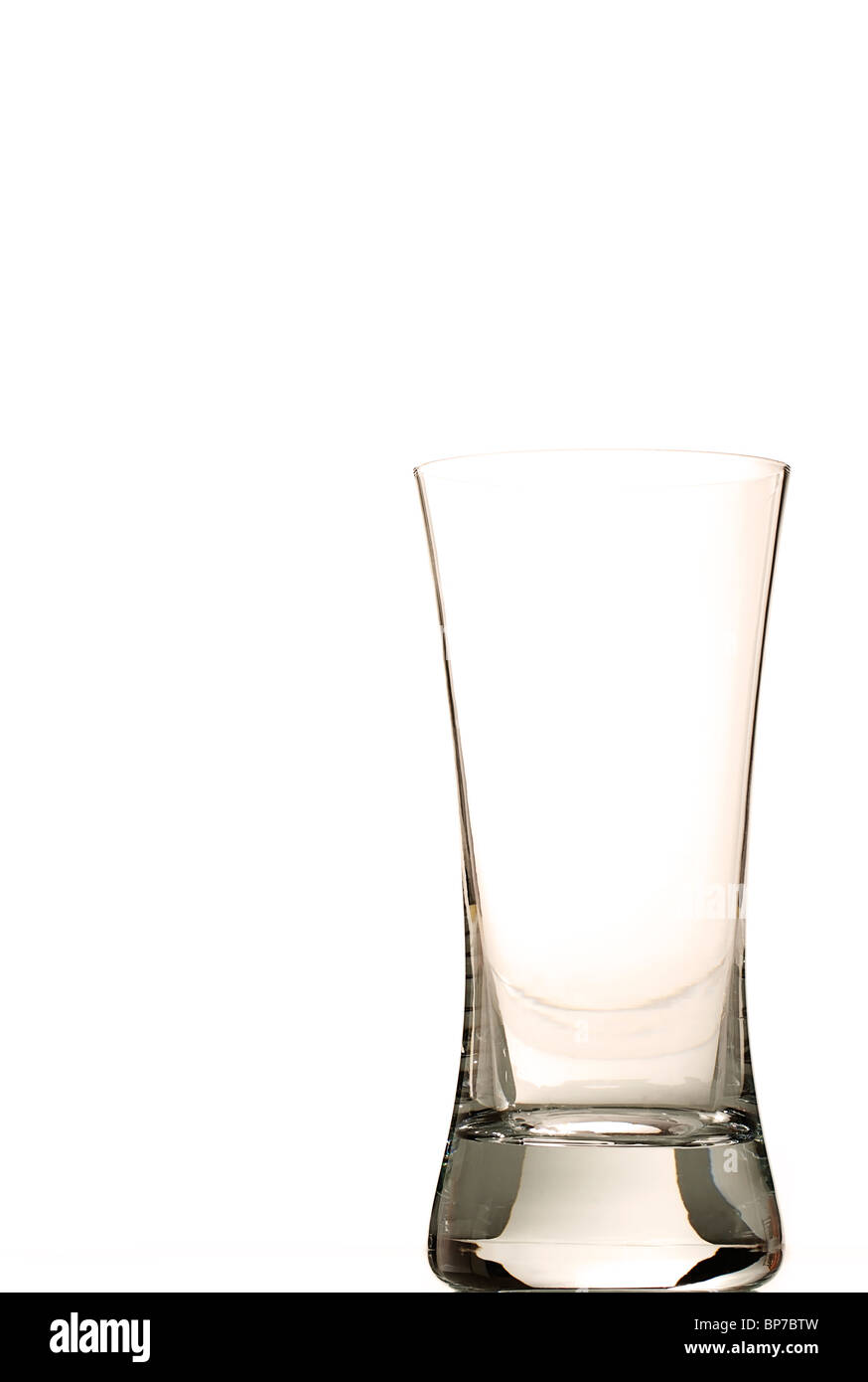 one empty glass on white background Stock Photo - Alamy