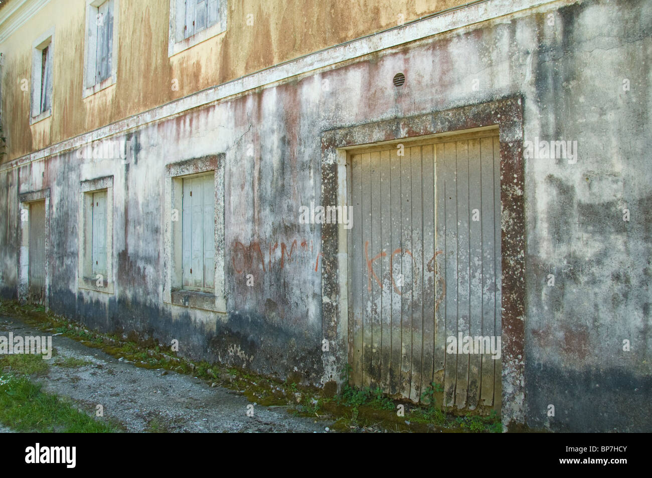 Run down shuttered building at Makrades on the Greek Mediterranean ...