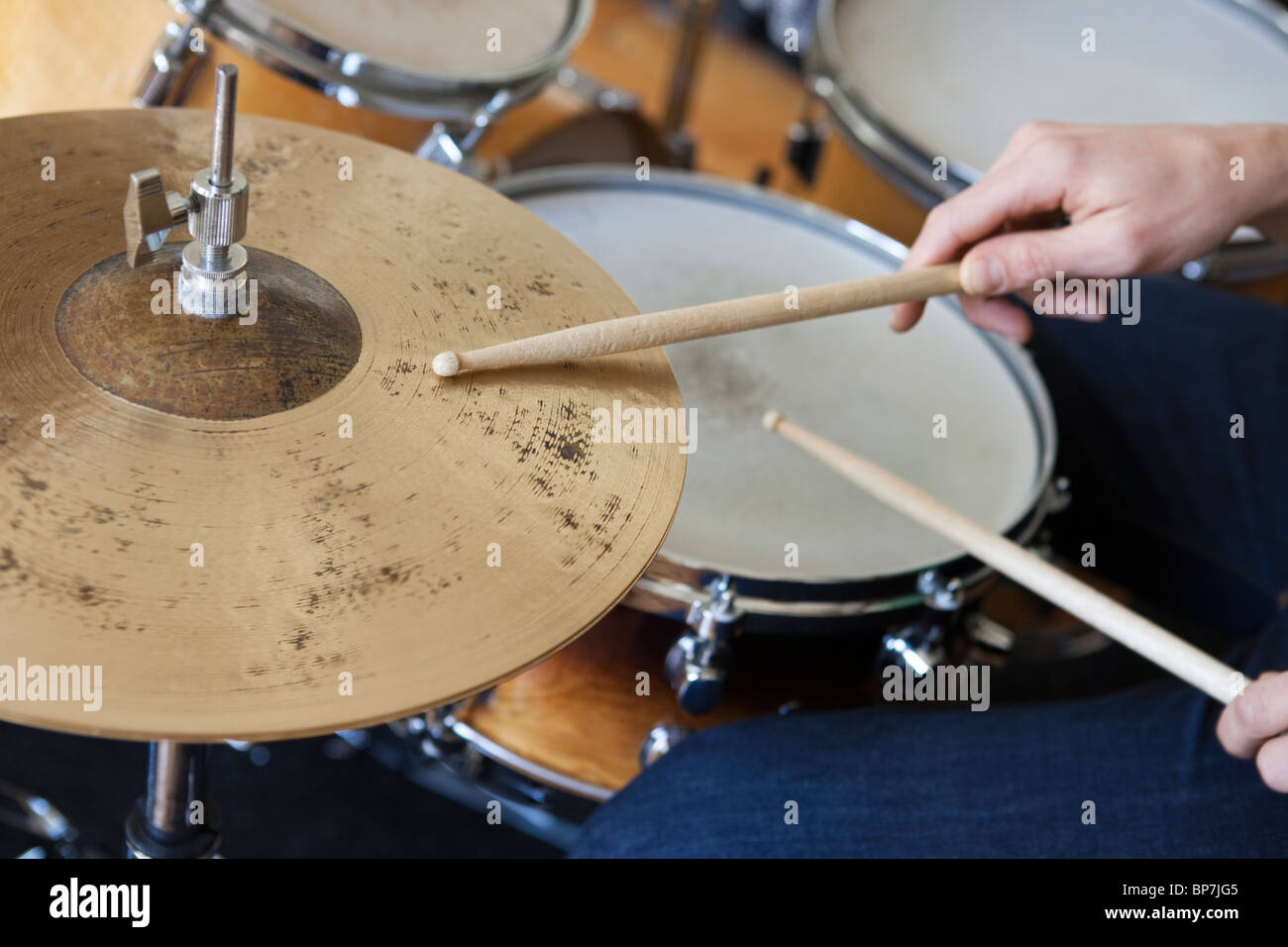 Musician performing on the drum set Stock Photo - Alamy