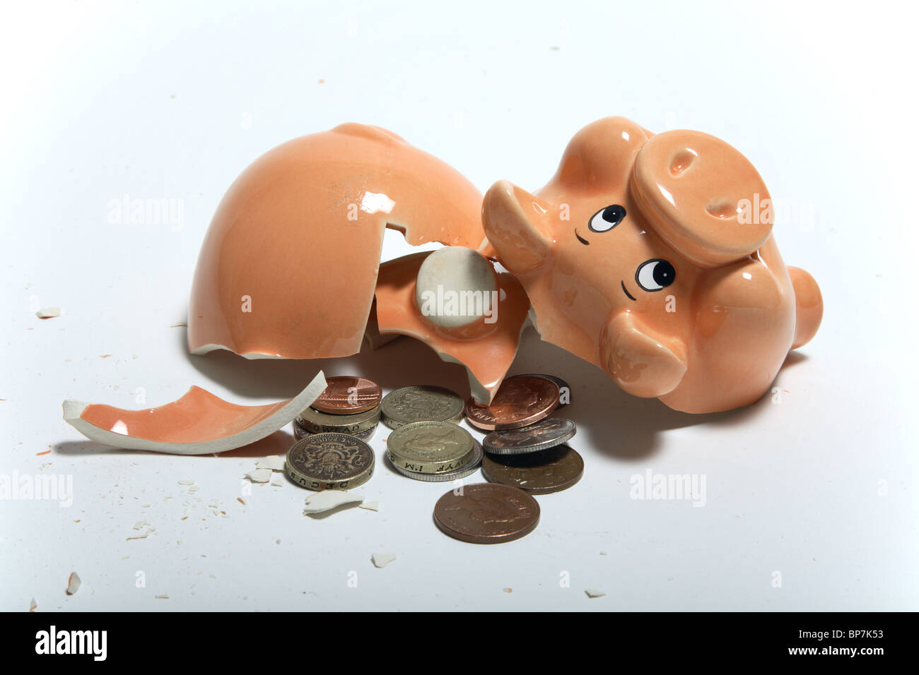 Broken piggy bank Stock Photo - Alamy