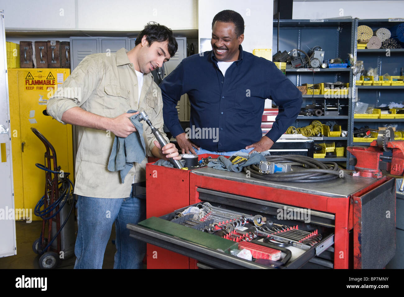 Two men power tools hi-res stock photography and images - Alamy