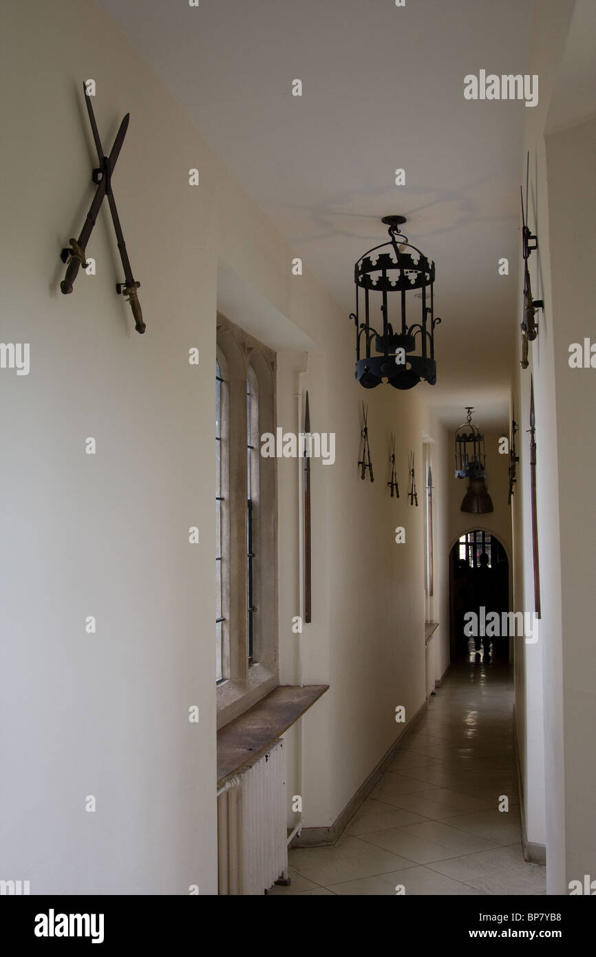 country house Medieval passage swords hanging wall Stock Photo - Alamy