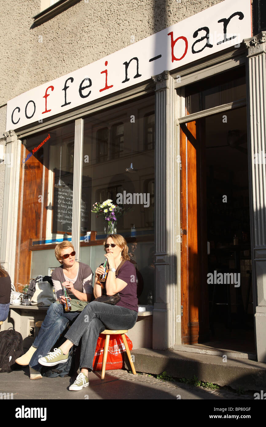 Two women in front of the coffein-bar in Berlin, Germany Stock Photo ...