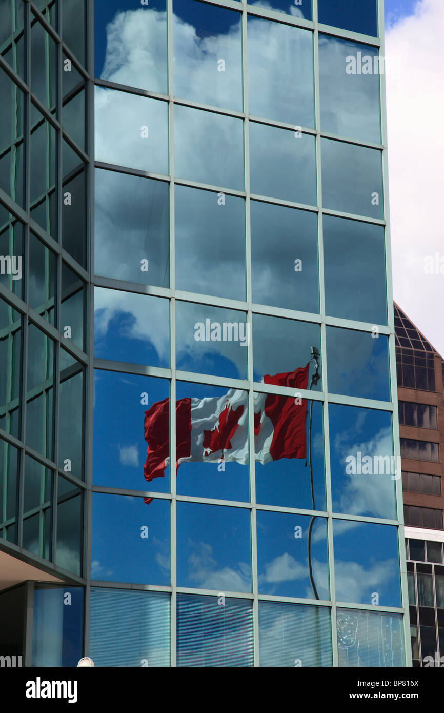 Canadian flag reflected in high rise building, Halifax, Nova Scotia ...