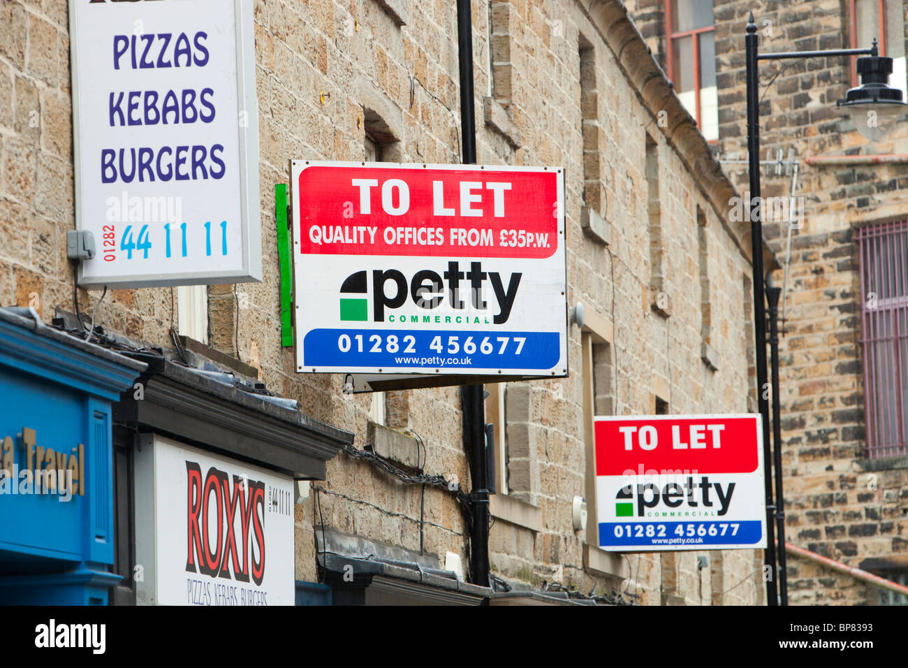 Shops for sale on the main street of Clitheore, Lancashire, UK, during ...