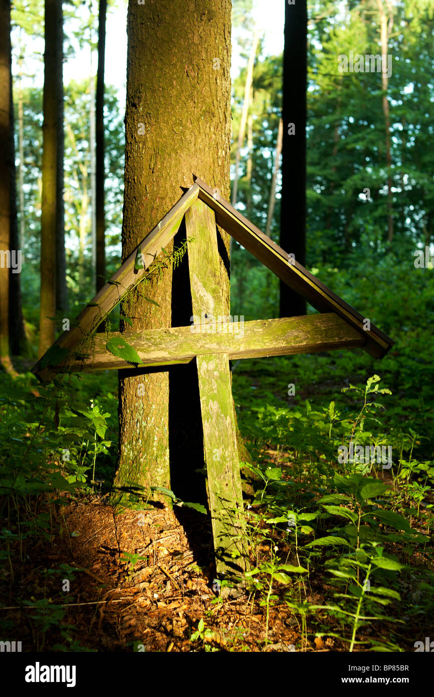 old wooden cross in a forest Stock Photo - Alamy