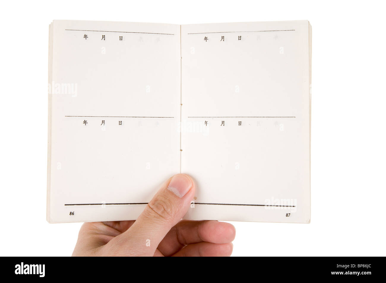 a chinese notebook with white background close up Stock Photo - Alamy