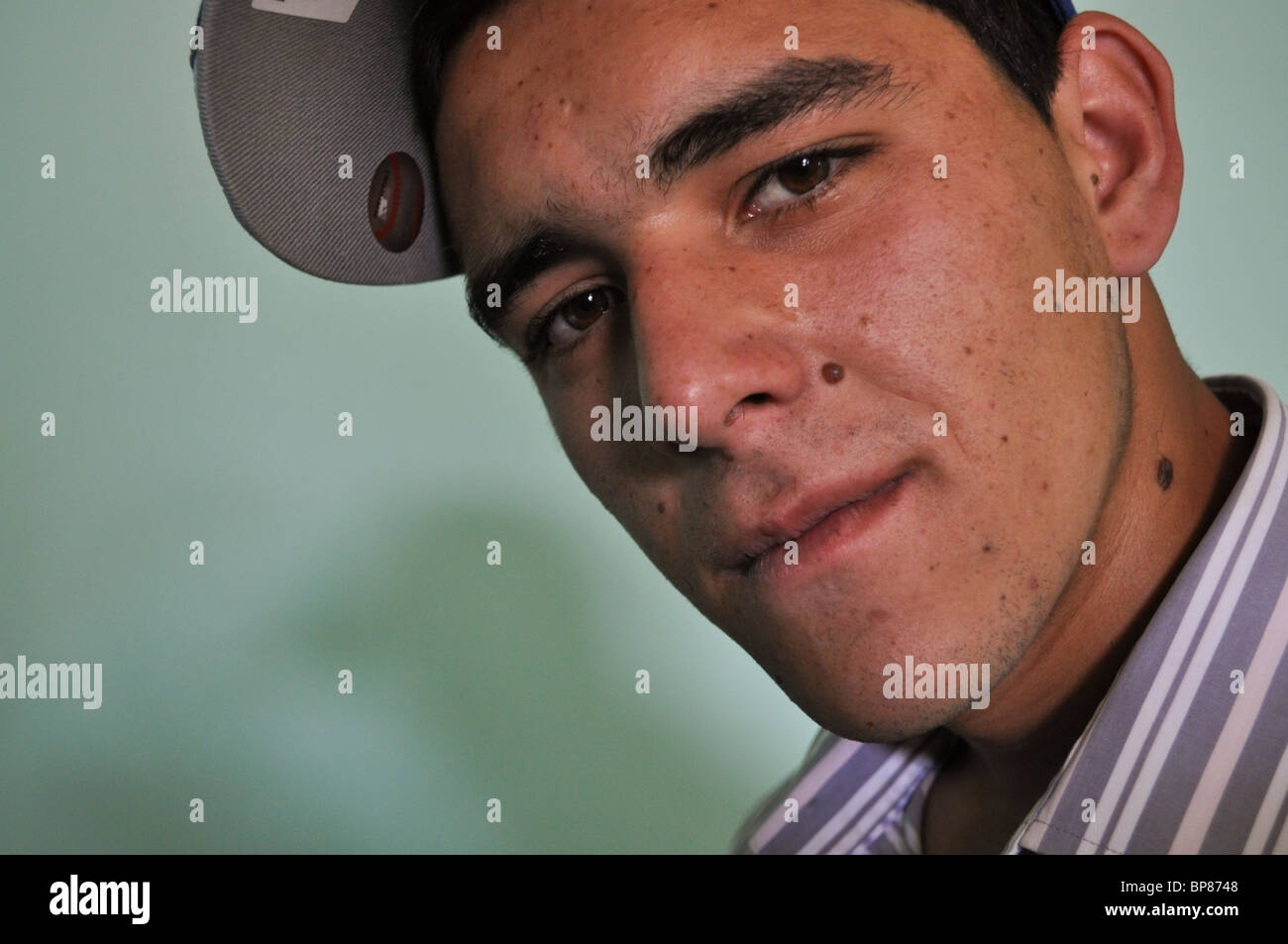 Young Man with Thoughtful Gaze Stock Photo - Alamy