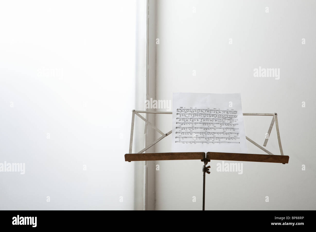 Sheet music on music stand Stock Photo - Alamy