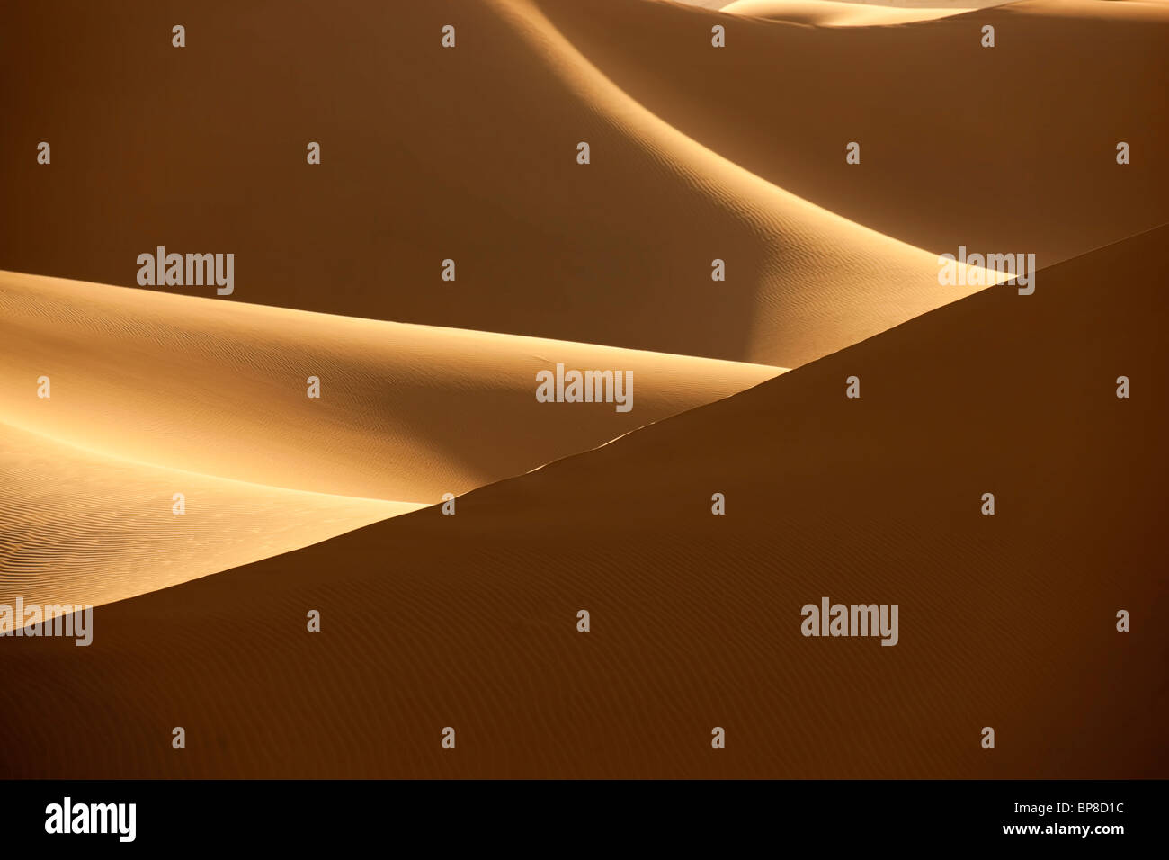 Sahara desert sand dunes with shadows Stock Photo - Alamy