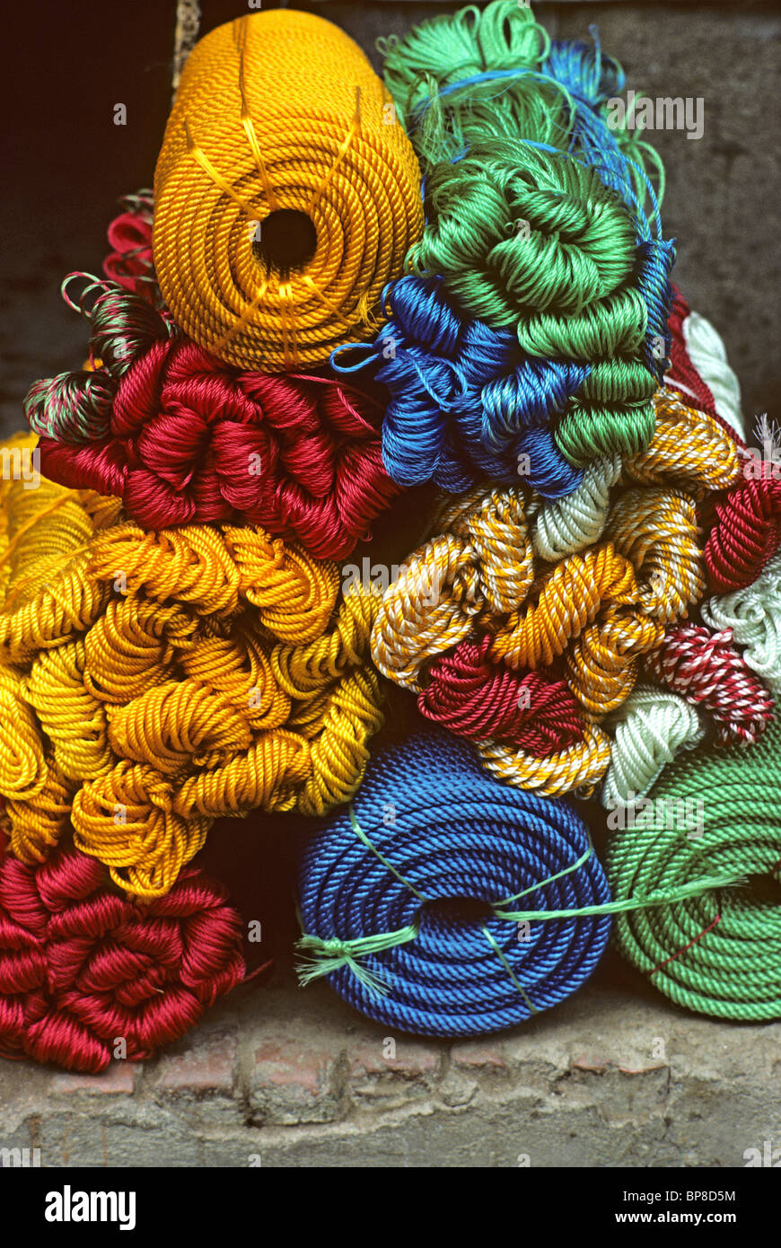 Colourful climbing ropes displayed in Kathmandu, Nepal Stock Photo - Alamy