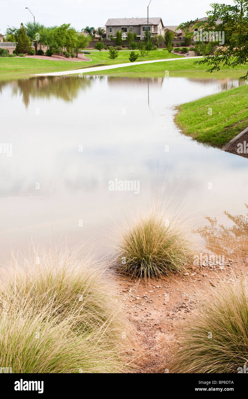 Storm water is collected in runoff basins in a residential area Stock ...