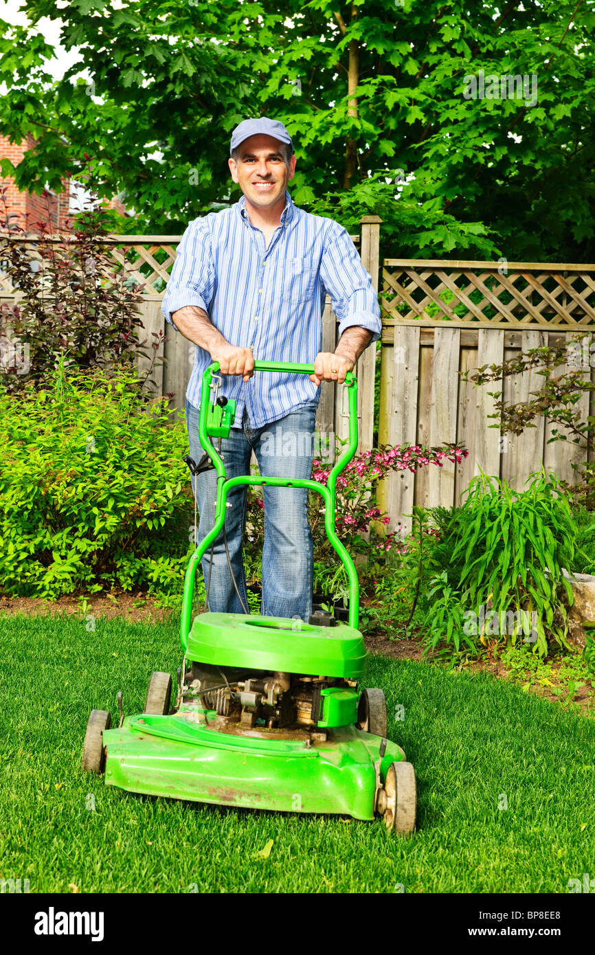Man mowing lawnmower cut grass hi-res stock photography and images - Alamy