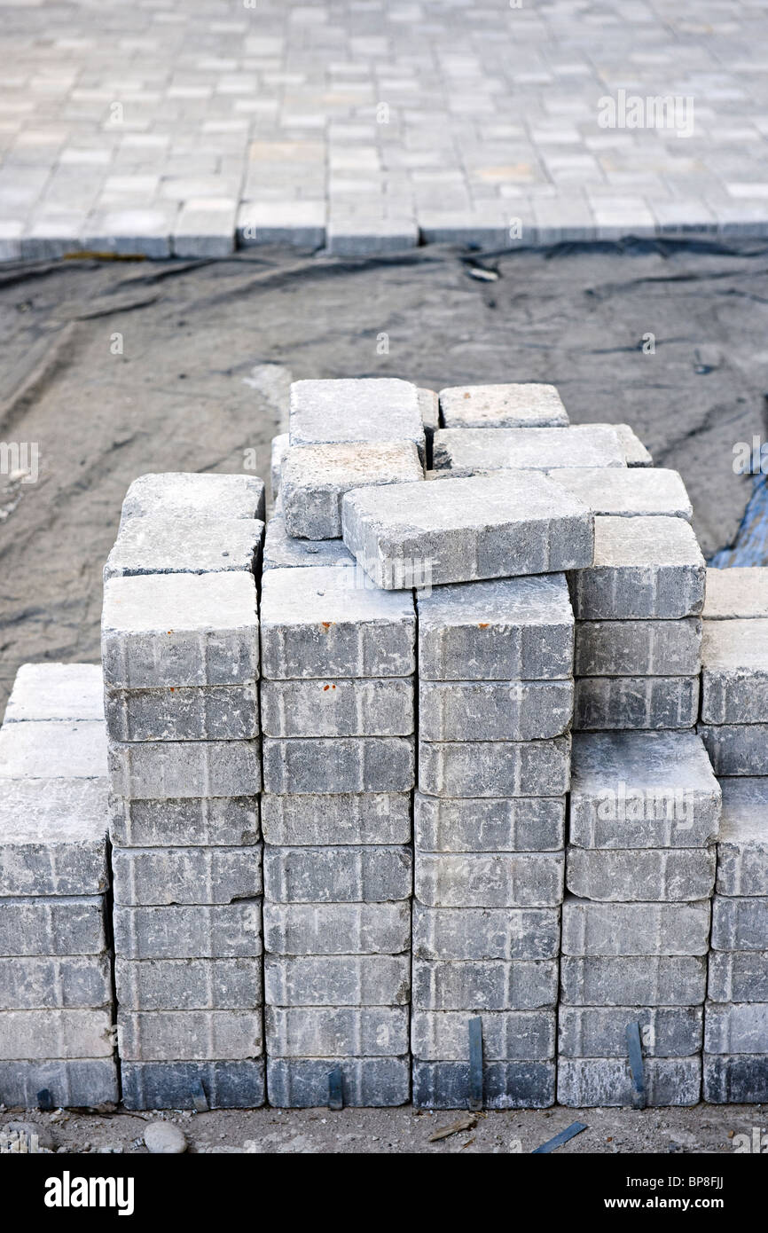 Stacks of interlocking stones for installing driveway landscaping Stock ...