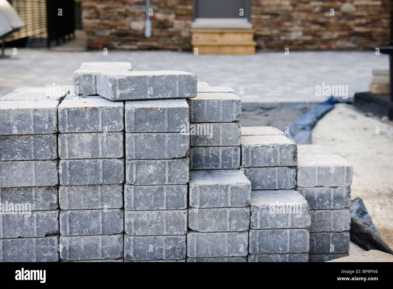 Stacks of interlocking stones for installing driveway landscaping Stock ...
