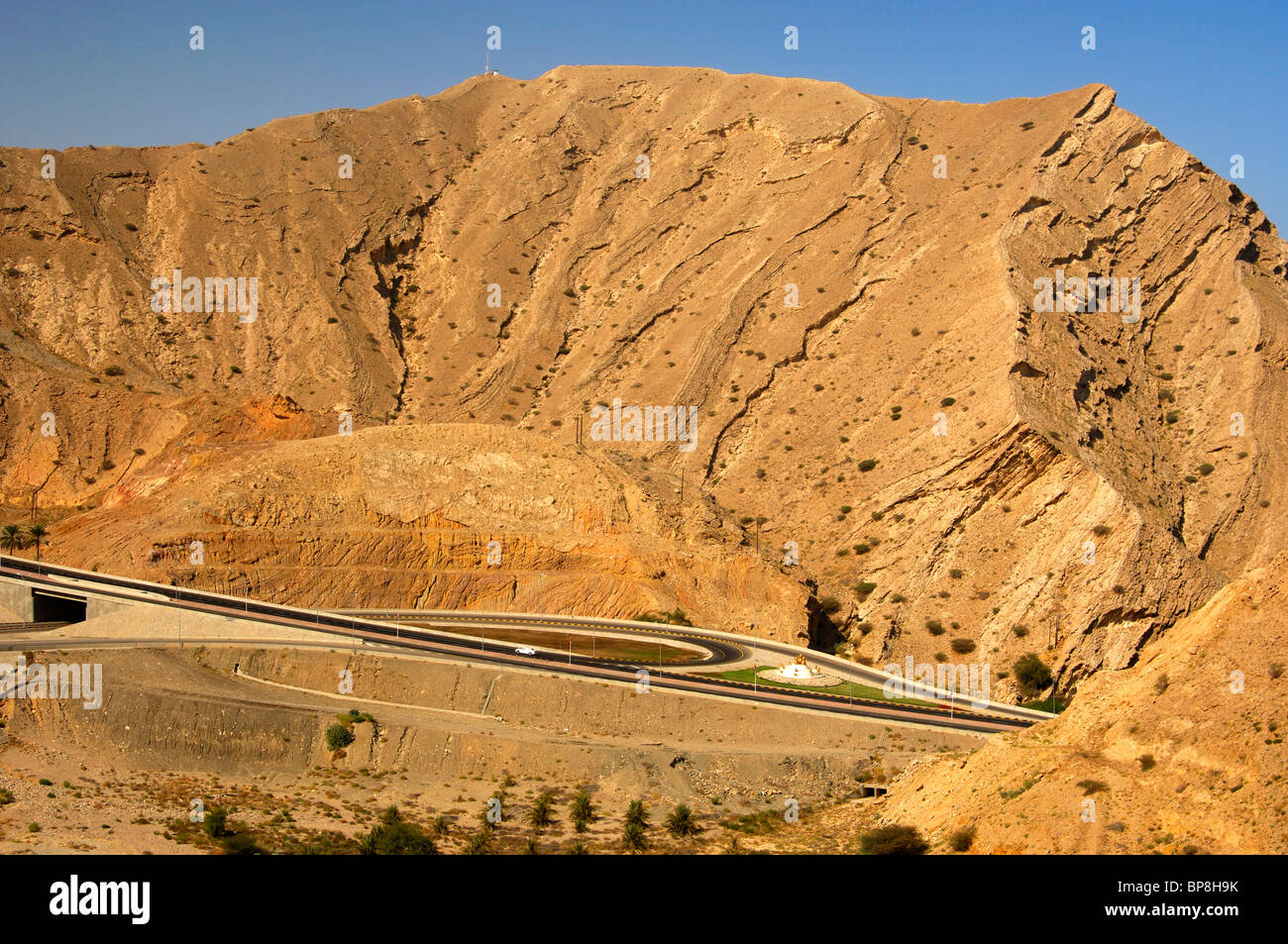 Modern highway in the barren mountains of Oman, Sultanate of Oman Stock ...