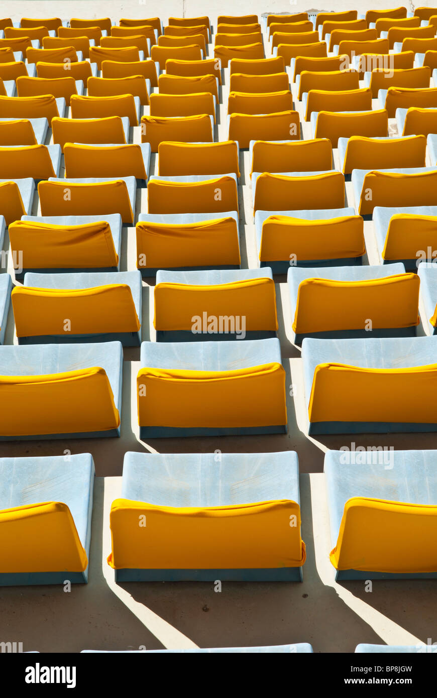 Yellow seats in sports city stadium Beirut Lebanon Stock Photo - Alamy