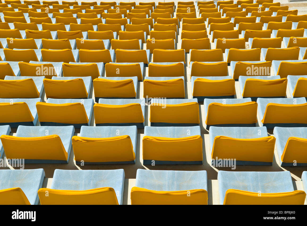 Yellow seats in sports city stadium Beirut Lebanon Stock Photo - Alamy