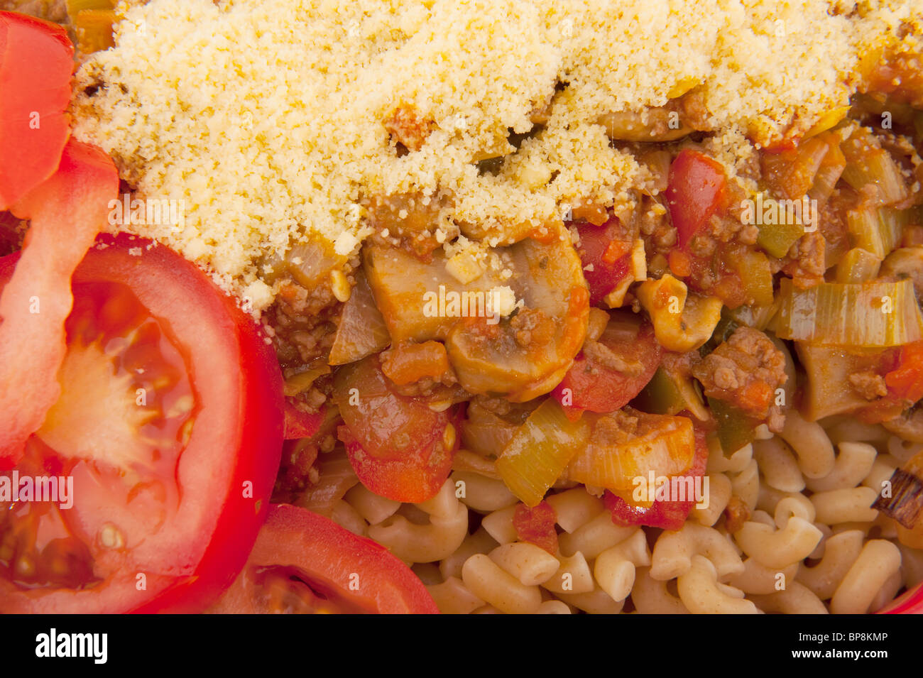 Healthy brown whole meal macaroni pasta with cheese and vegetables ...