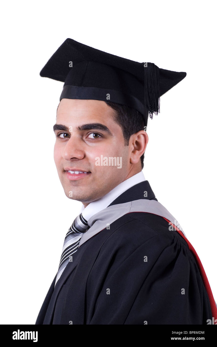 Young good looking Asian university graduate wearing cap and gown ...