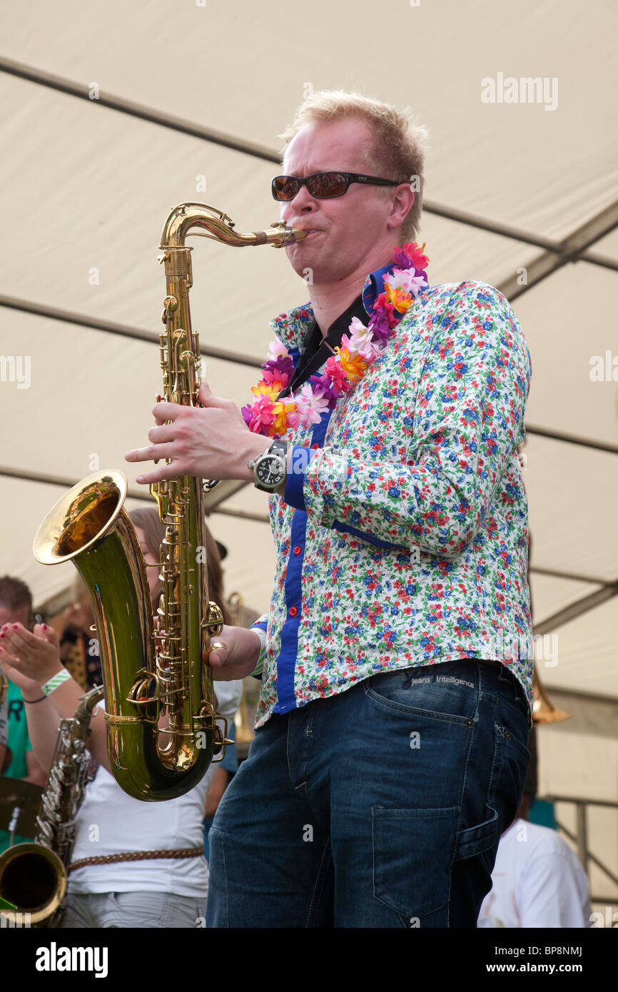 Male saxophonist from the Dutch big band Stroat Ensemble, performing at ...