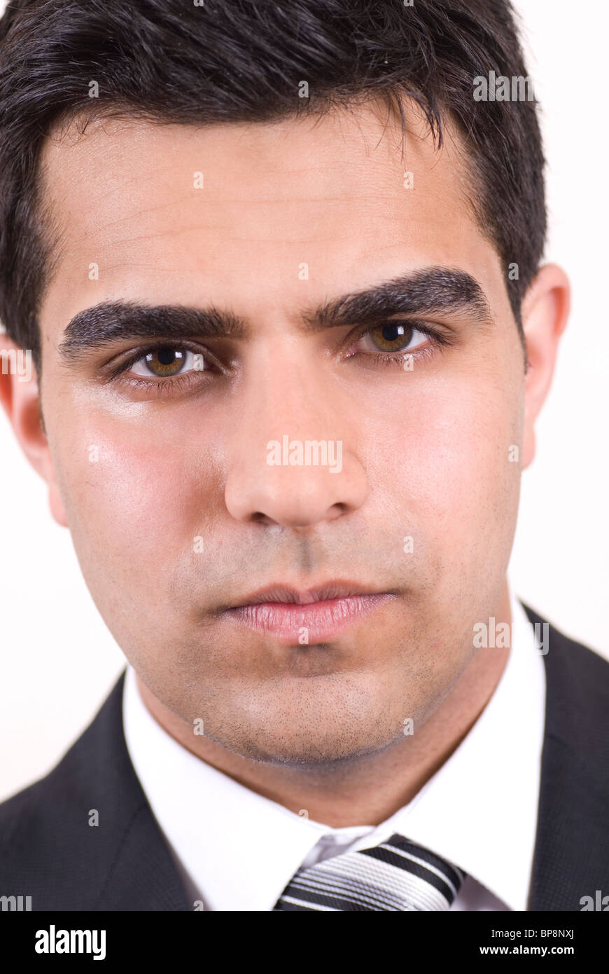 Closeup portrait of a serious young middle eastern business man Stock ...
