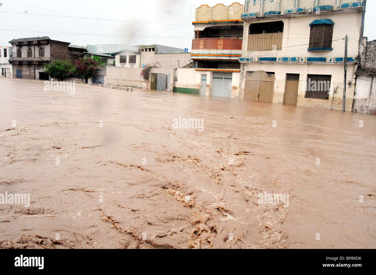 View of flood water during downpour in Peshawar Stock Photo - Alamy