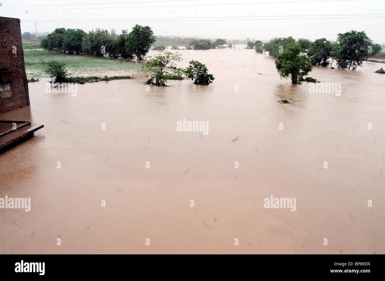 View of flood-affected area during downpour in Peshawar Stock Photo - Alamy