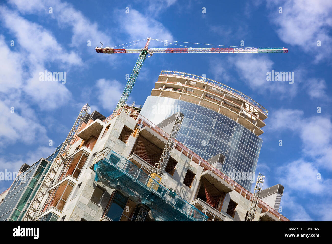 Skyscraper and apartments building under construction Stock Photo - Alamy