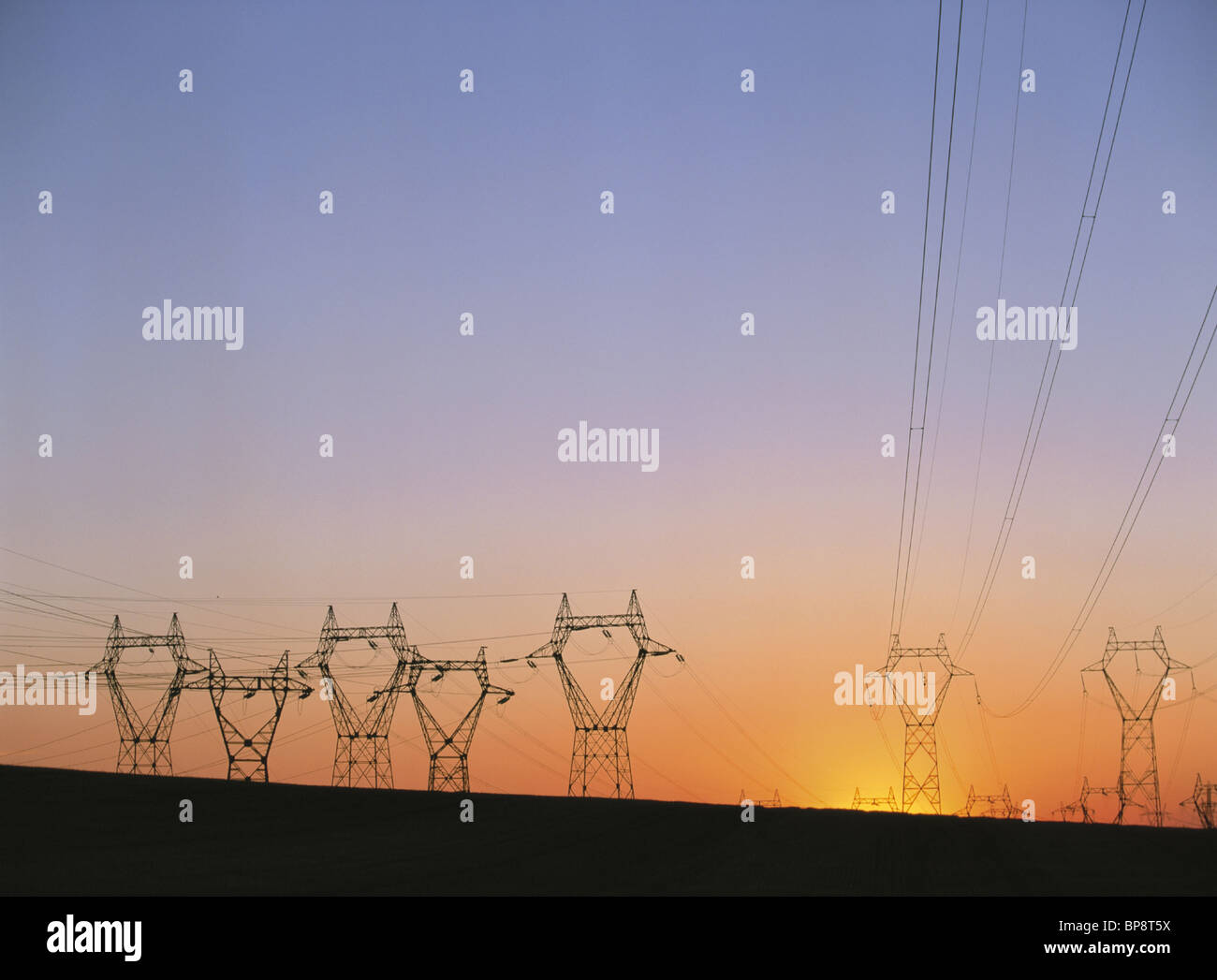 Electricity Pylons and Power Lines at Sunset. Germany, Europe Stock ...