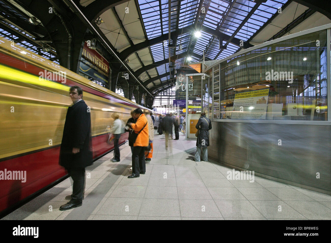 Person in train station hi-res stock photography and images - Alamy