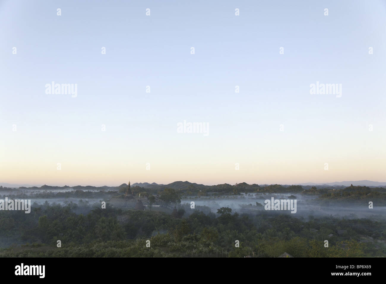 Rainforest Shrouded in Fog at Sunset. Myanmar Stock Photo - Alamy